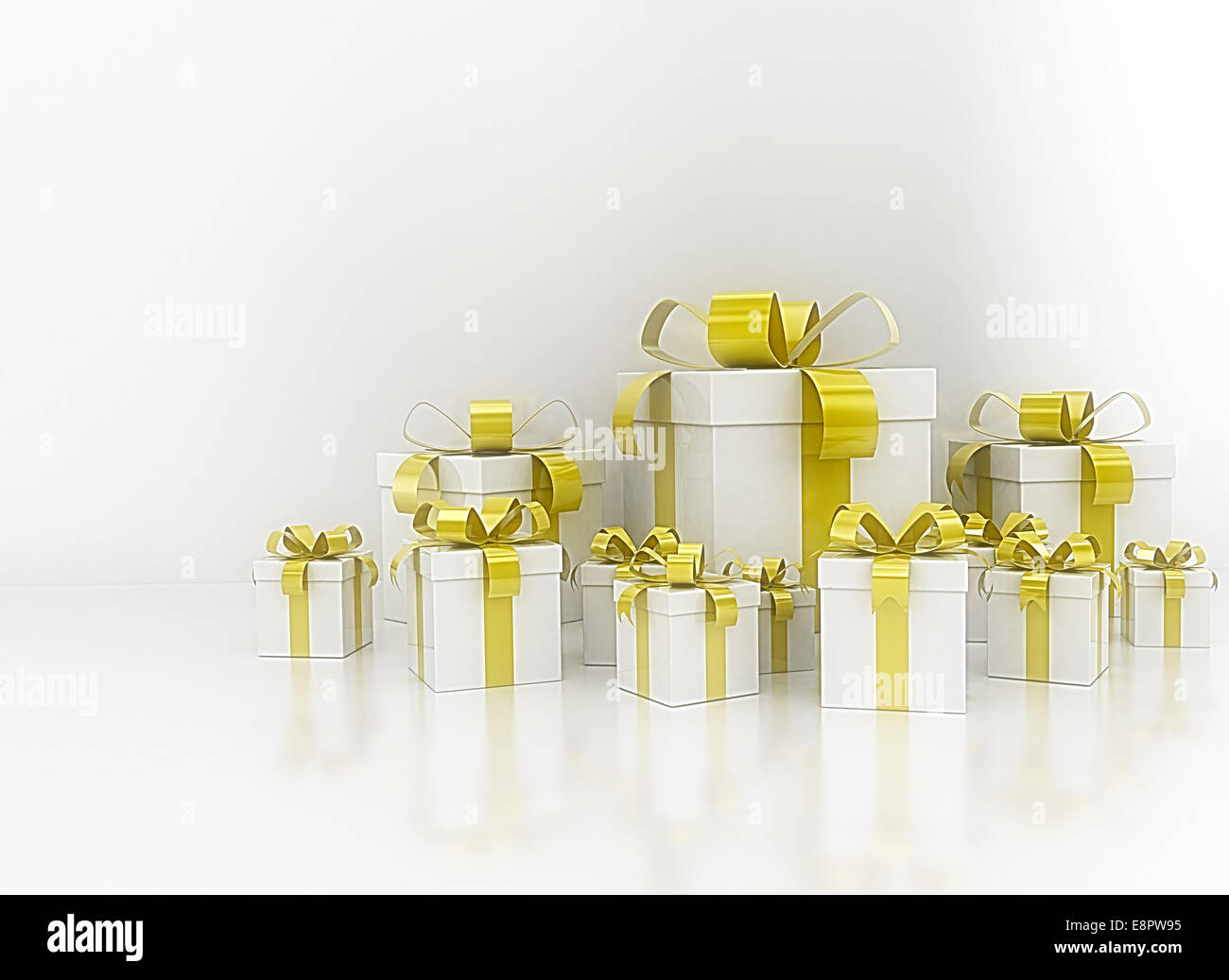 Group of gold ribbon gift boxes Stock Photo - Alamy