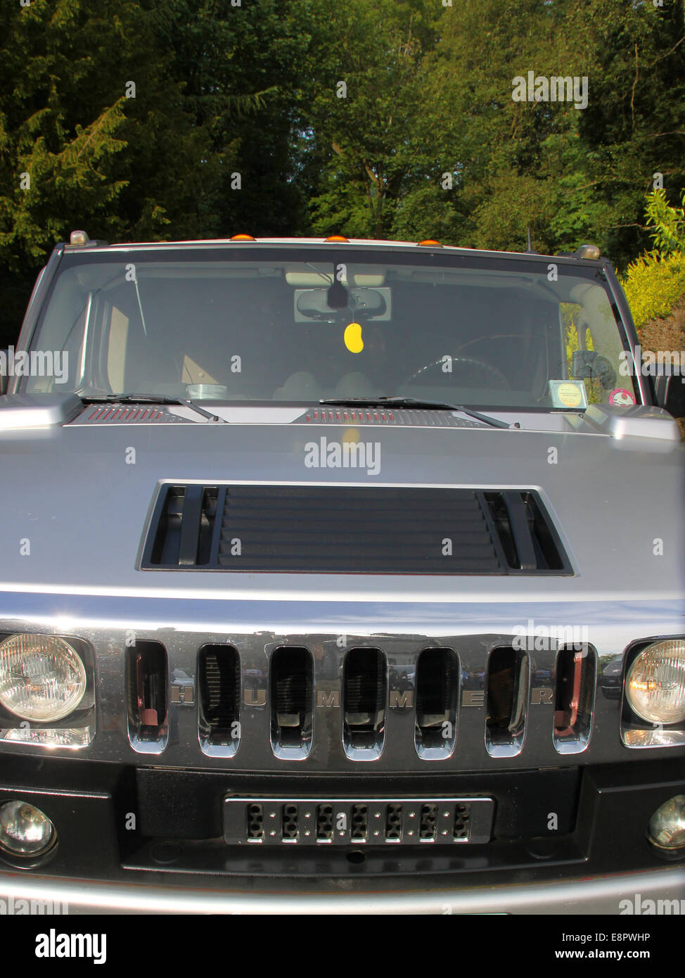 Silver Humvee limousine car Stock Photo - Alamy