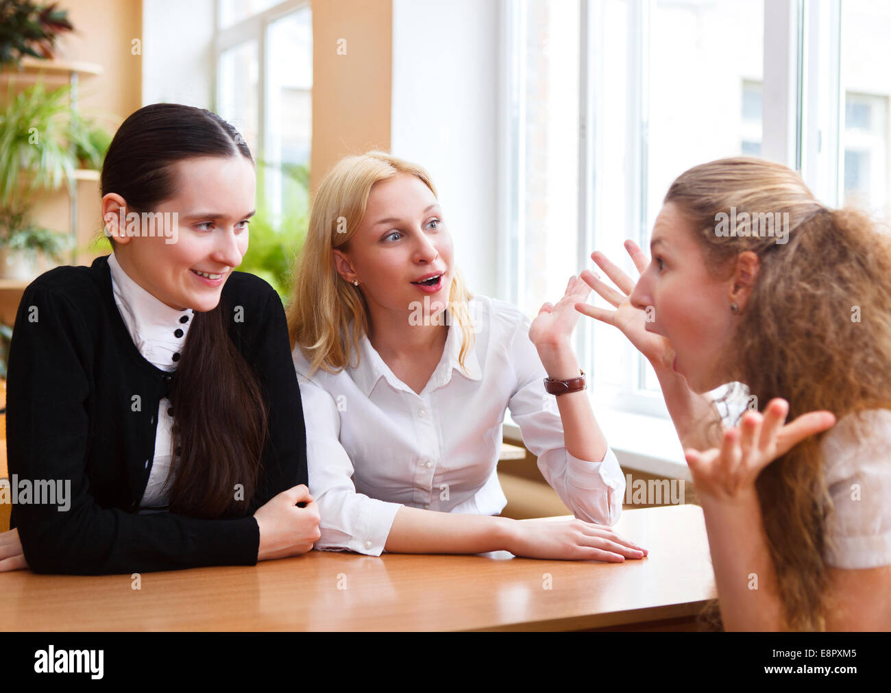 Group of student girls during a brake between classes - chatting and ...
