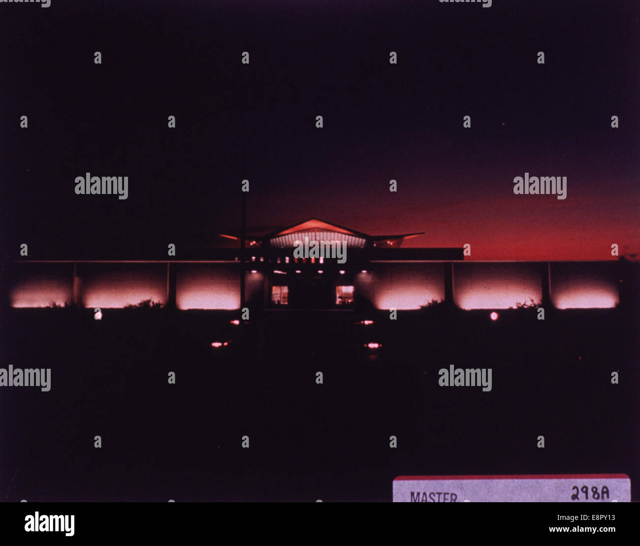 A photograph showcasing the National Library of Medicine at night. The ...