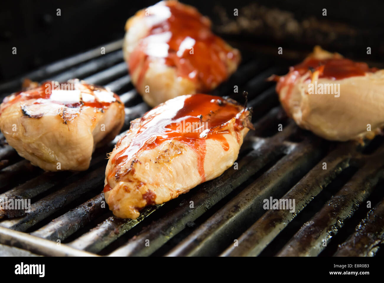 barbeque chicken cooking on the hot outdoor grill Stock Photo - Alamy