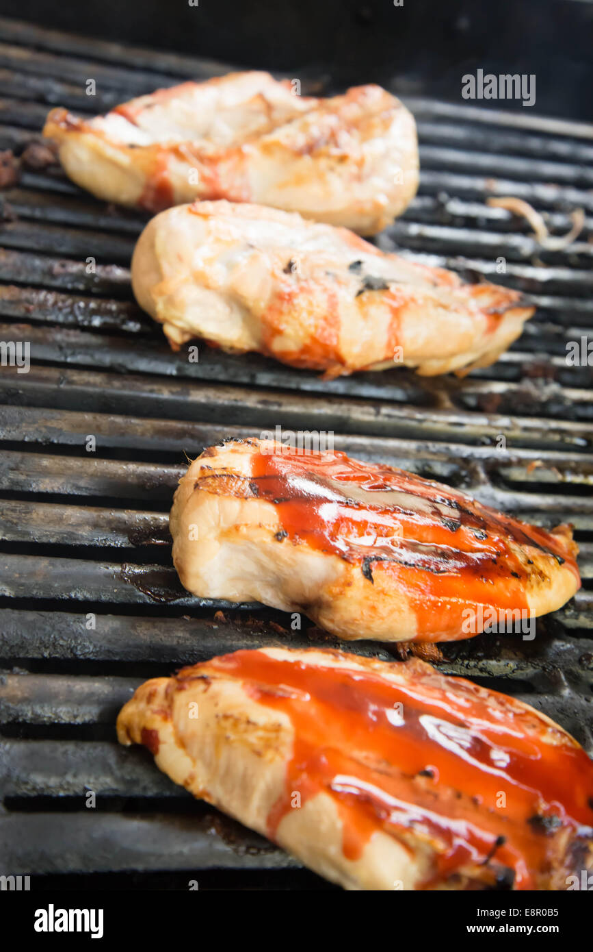 barbeque chicken cooking on the hot outdoor grill Stock Photo - Alamy