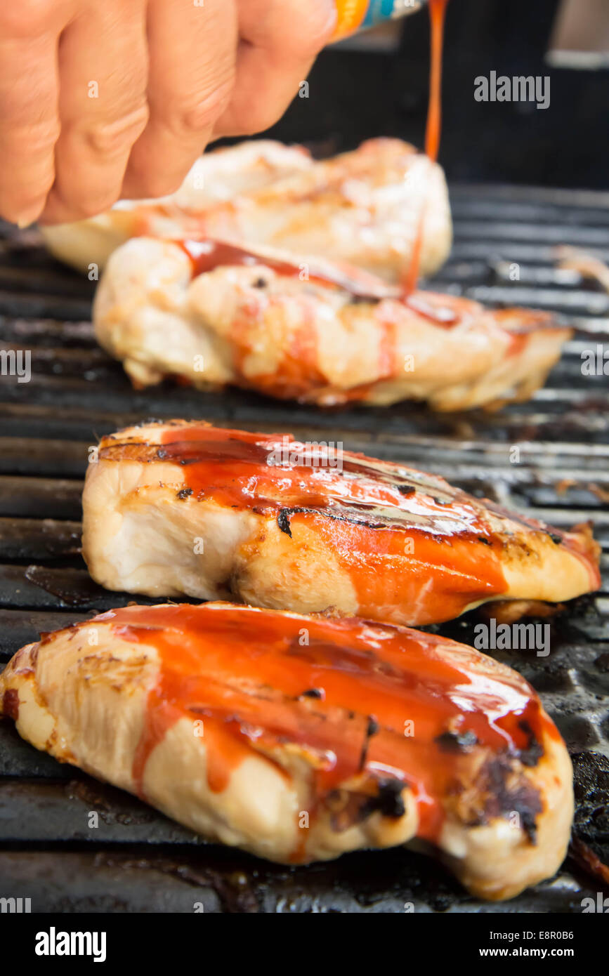 barbeque chicken cooking on the hot outdoor grill Stock Photo - Alamy