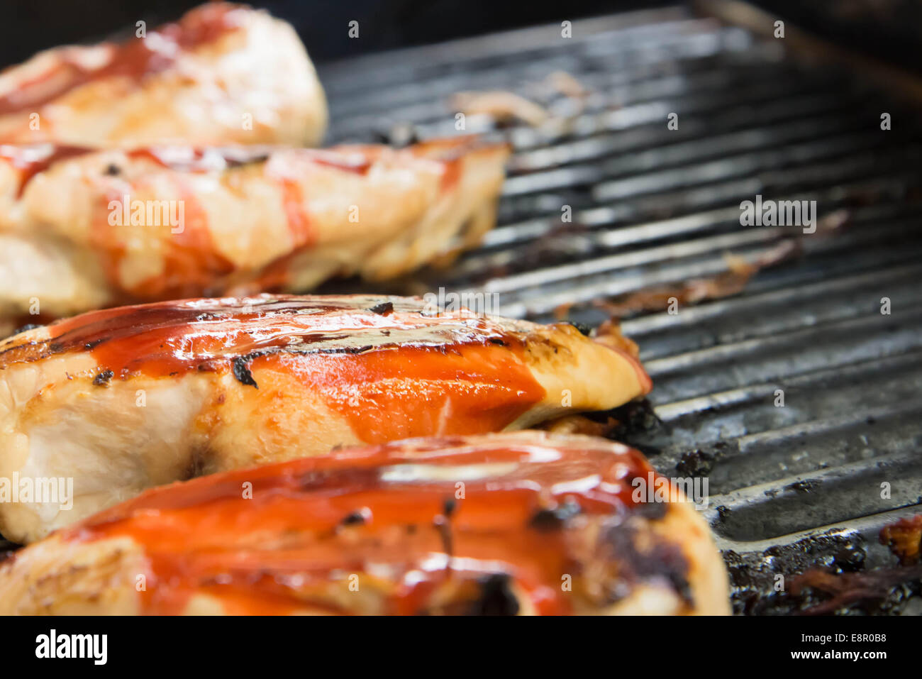 barbeque chicken cooking on the hot outdoor grill Stock Photo - Alamy