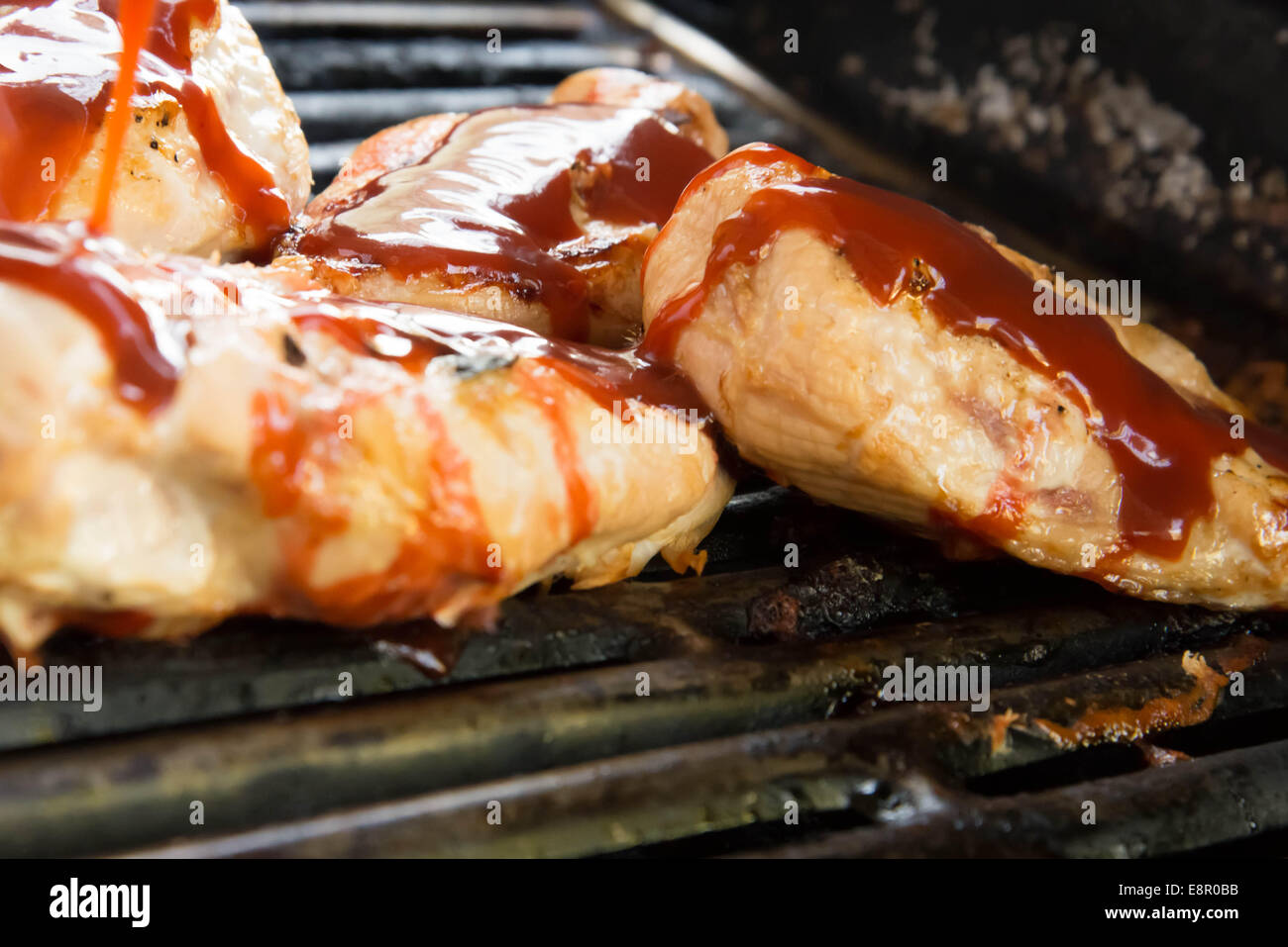 barbeque chicken cooking on the hot outdoor grill Stock Photo - Alamy