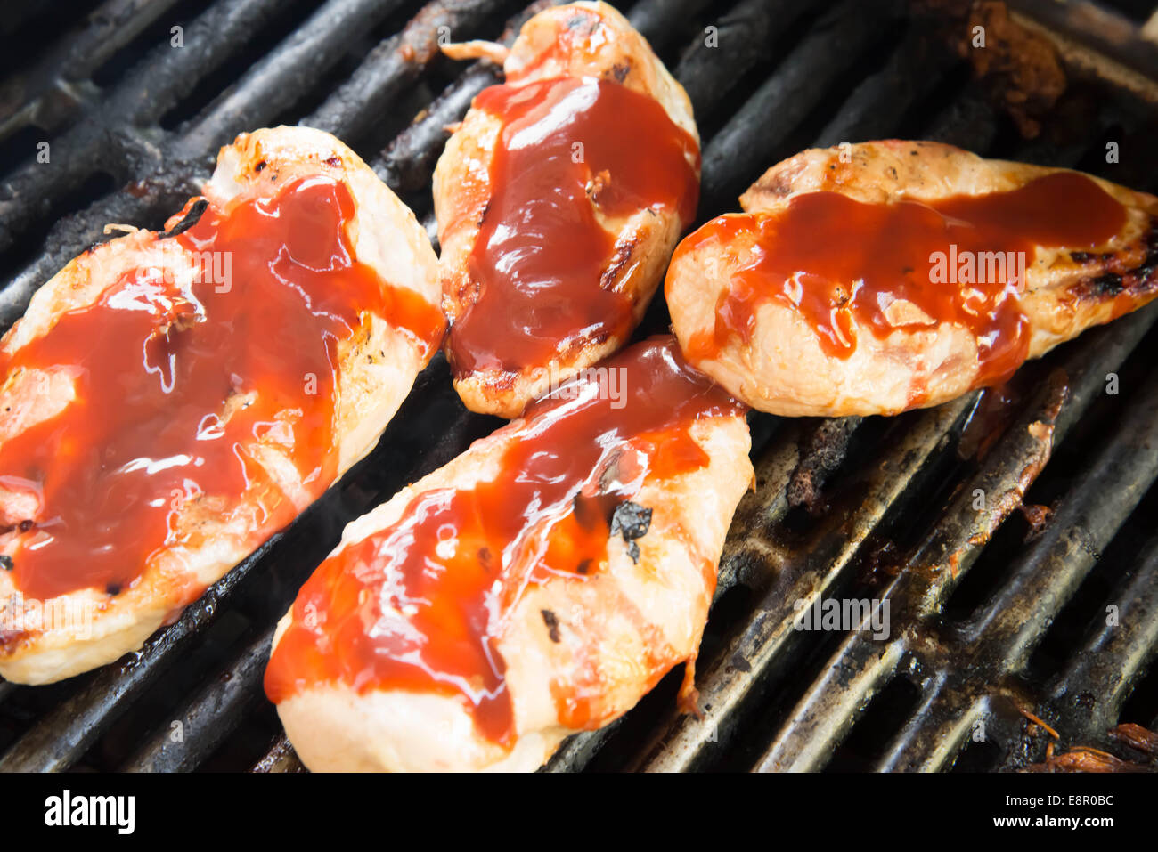 barbeque chicken cooking on the hot outdoor grill Stock Photo - Alamy