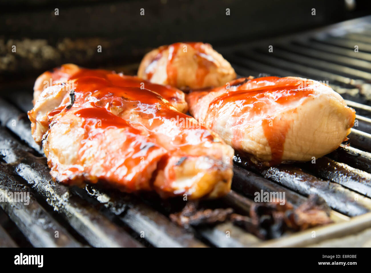 barbeque chicken cooking on the hot outdoor grill Stock Photo - Alamy