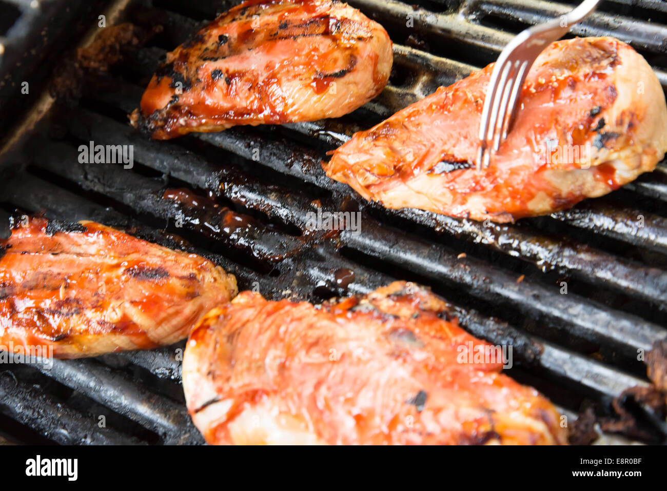 barbeque chicken cooking on the hot outdoor grill Stock Photo - Alamy