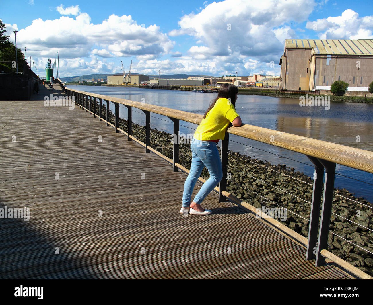 Young girl looking out over River Clyde Stock Photo - Alamy