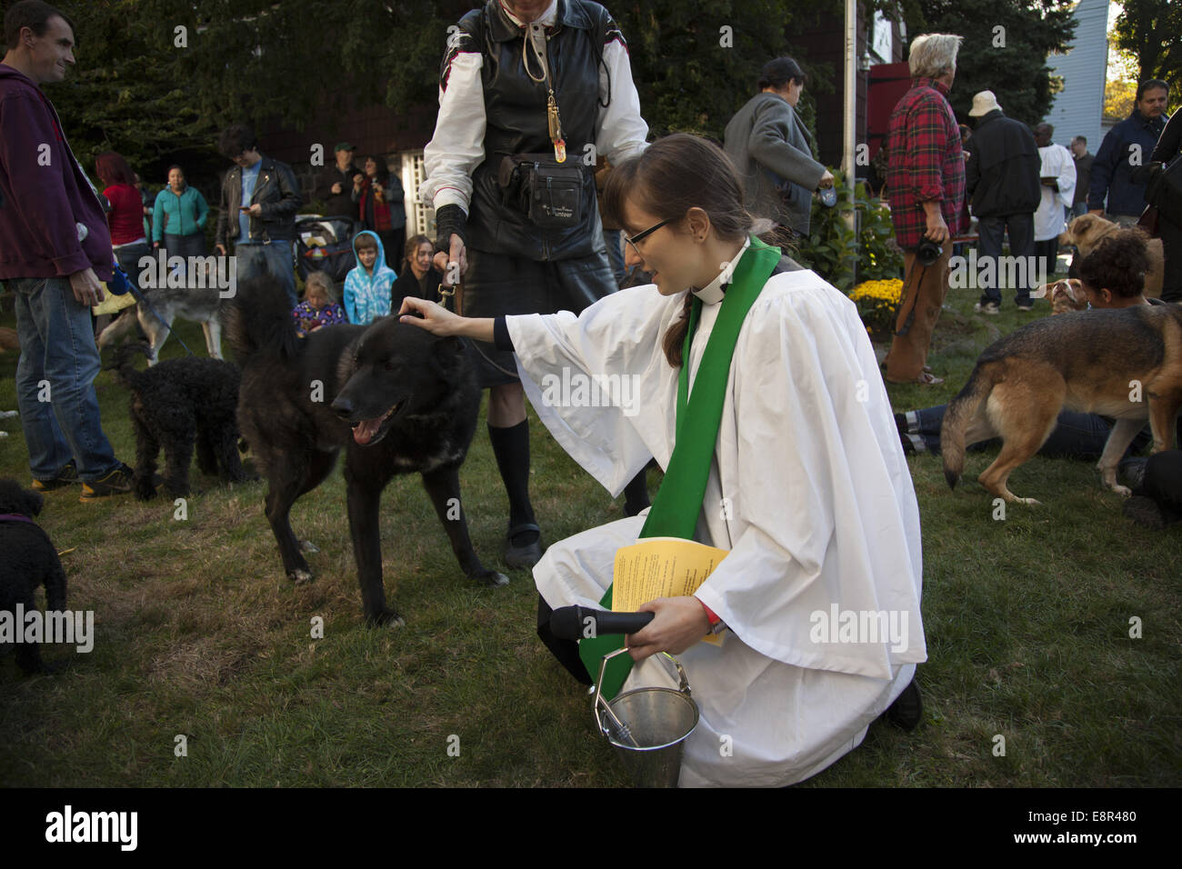 Blessing of the Animals service in an Episcopal church garden in ...