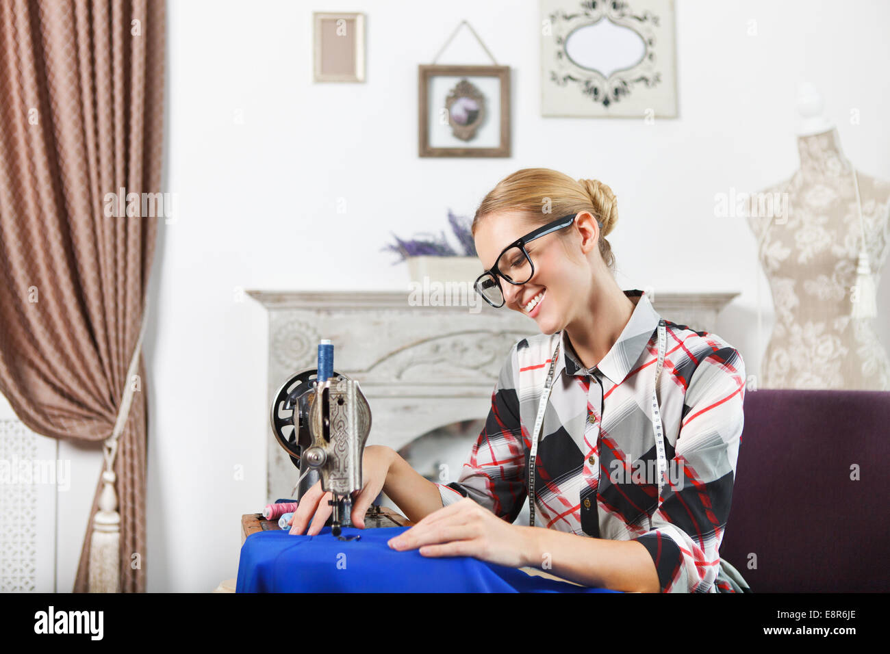 Vintage tailor dressmaker in her studio, old fashion style Stock Photo ...