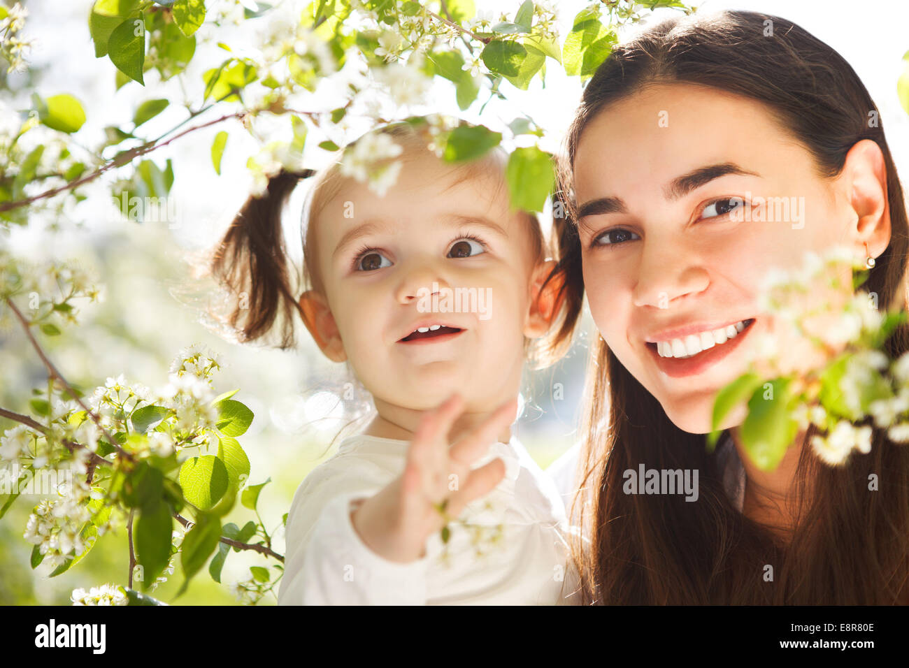 Happy mother and her little daughter in the spring day Stock Photo - Alamy