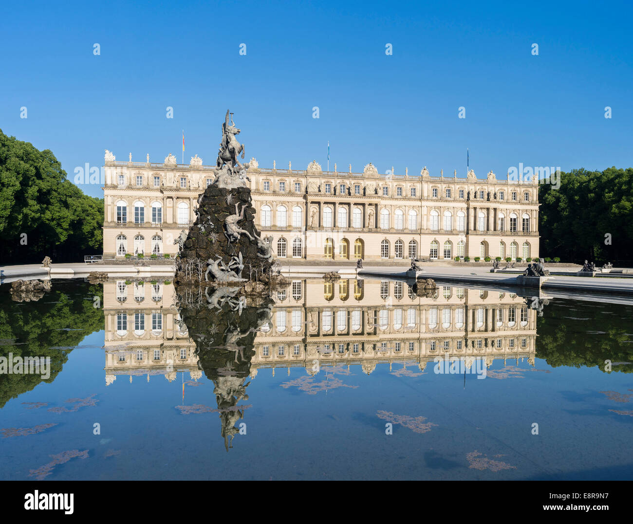 Herrenchiemsee Palace, located on an island in lake Chiemsee, water ...
