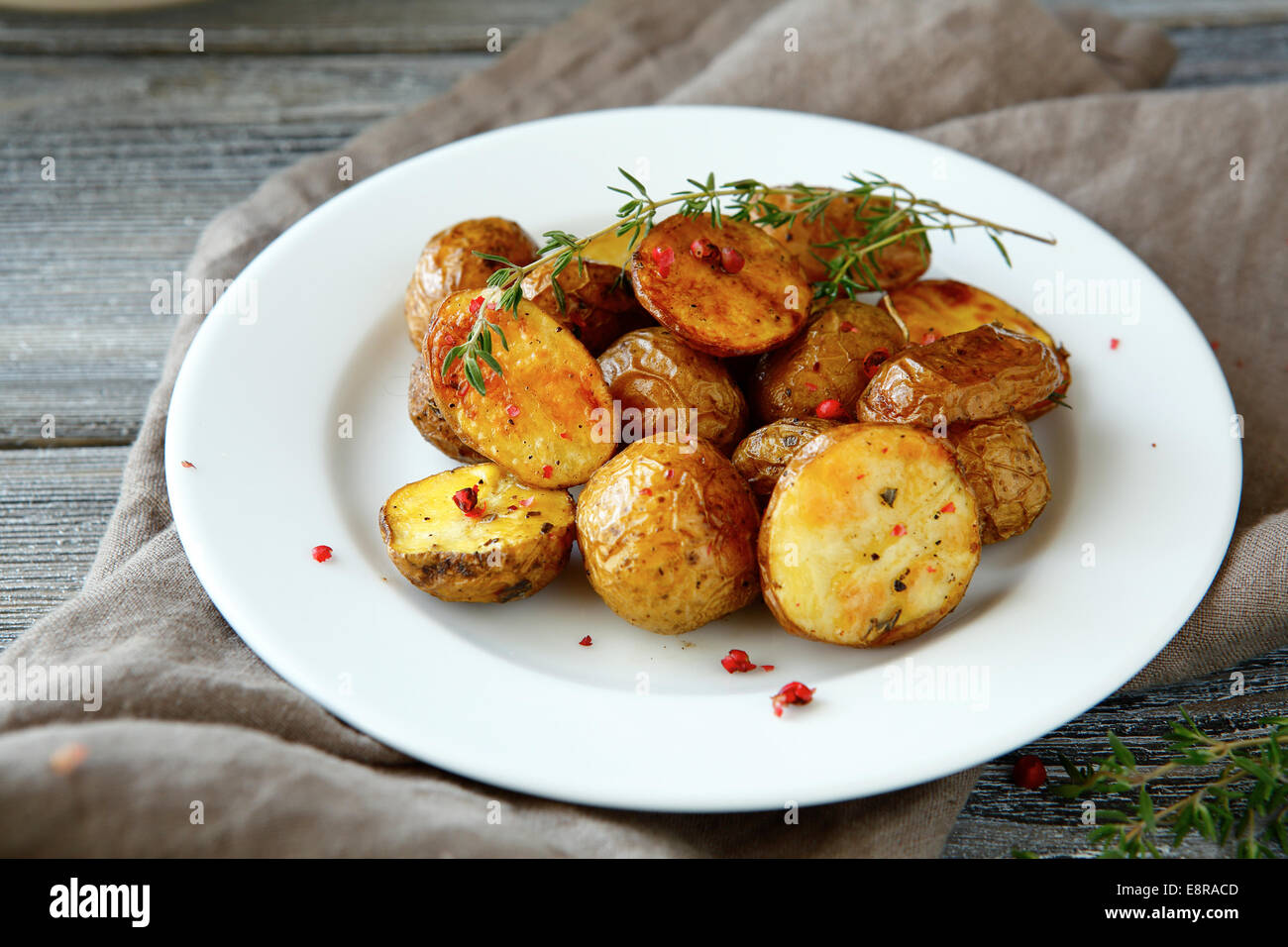Plate seasoned roasted potatoes hi-res stock photography and images - Alamy