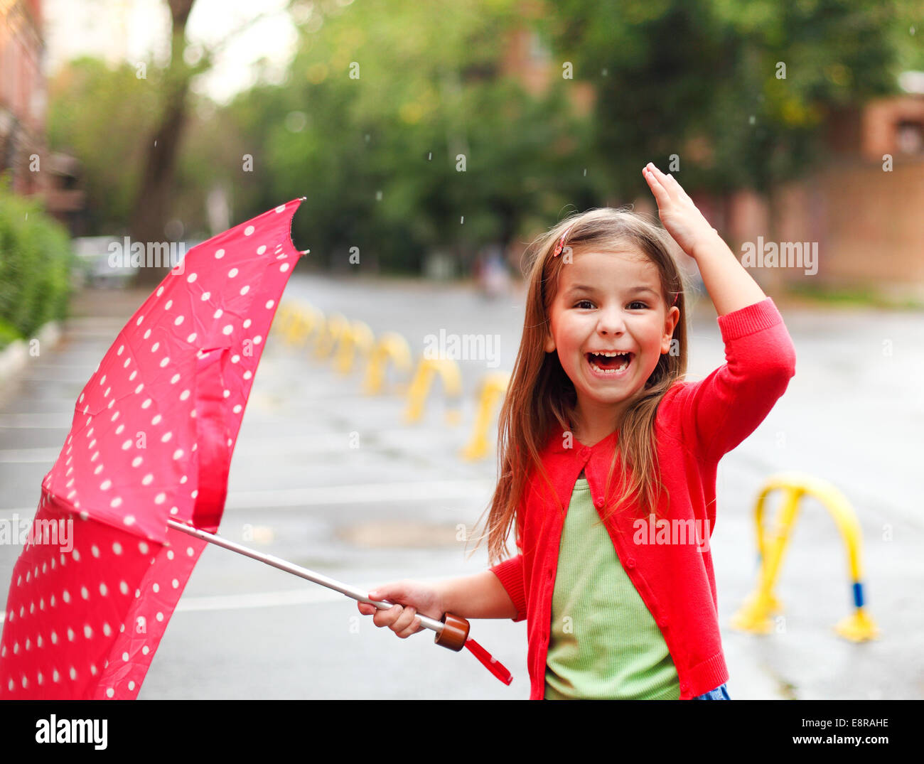 Girl wearing rain boots hi-res stock photography and images - Alamy