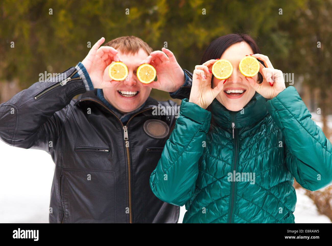 Young happy couple fun snow hi-res stock photography and images - Alamy