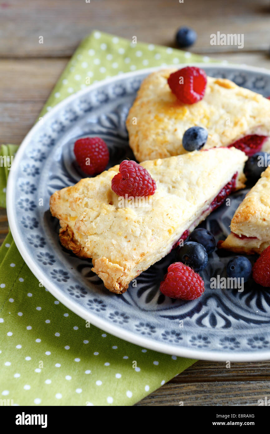 scones with raspberry and blueberries, food closeup Stock Photo - Alamy
