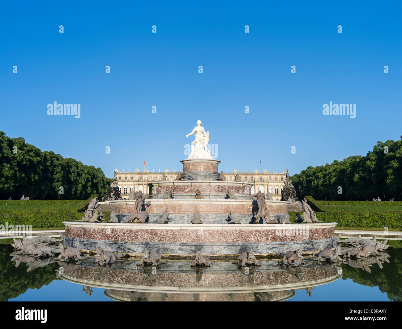 Herrenchiemsee Palace on an island in lake Chiemsee, water games with ...