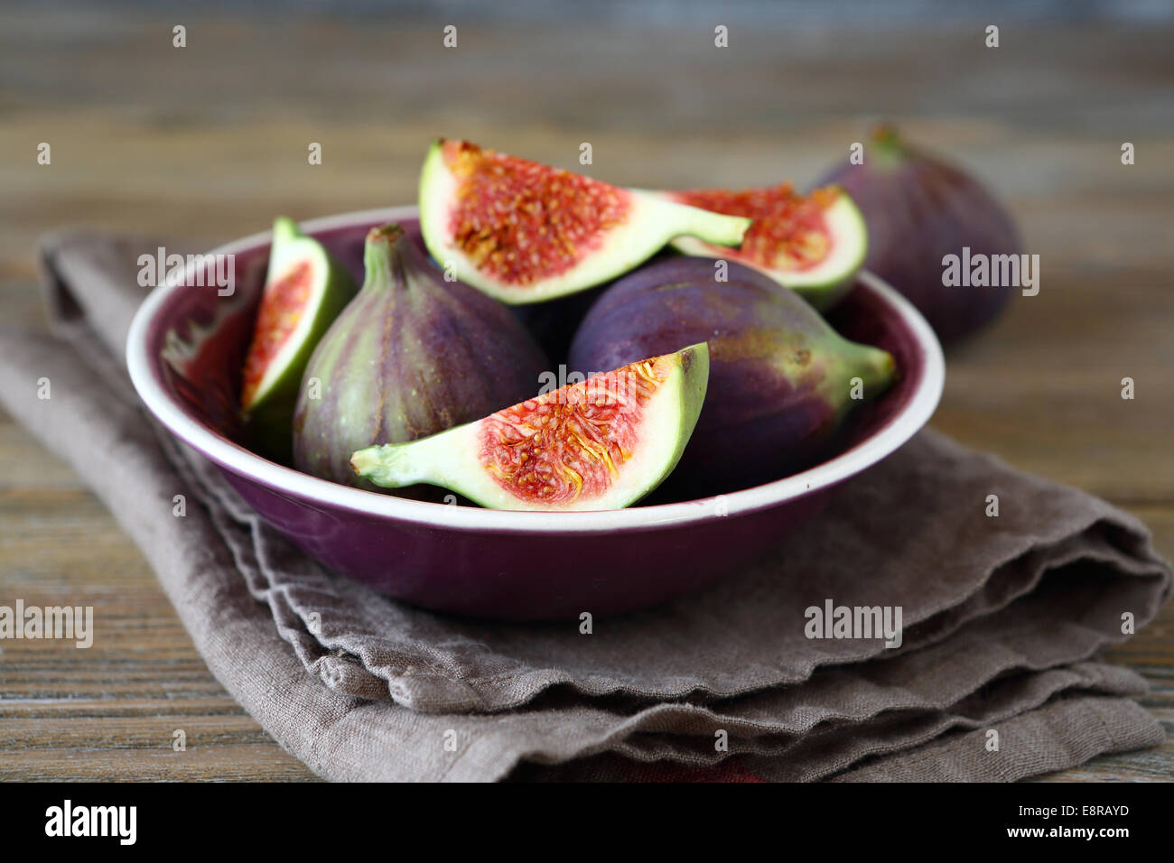 Fresh figs in wooden bowl hi-res stock photography and images - Alamy