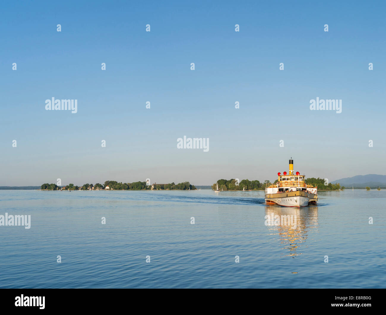 Lake Chiemsee with the island Fraueninsel with the Bavarian Alps in the ...