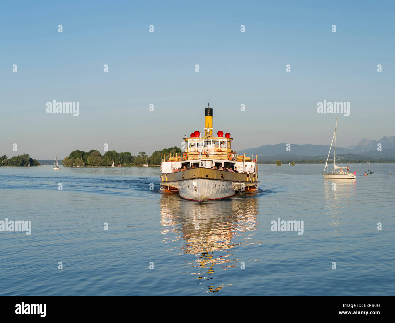 Lake Chiemsee with the island Fraueninsel with the Bavarian Alps in the ...