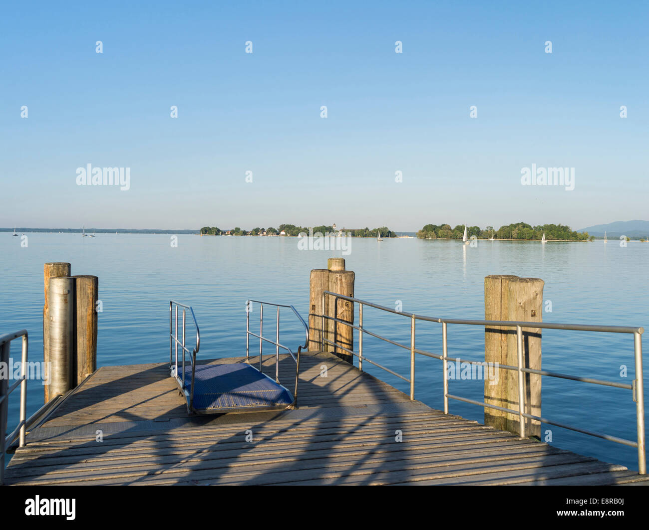 Lake Chiemsee with the island Fraueninsel with the Bavarian Alps in the ...