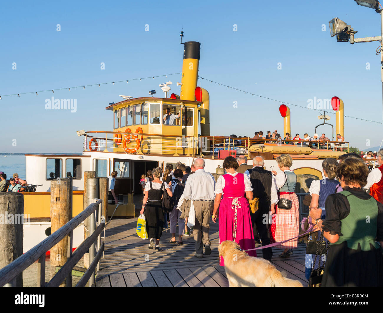 Lake Chiemsee, tourists boarding the excursion boat after visiting the ...