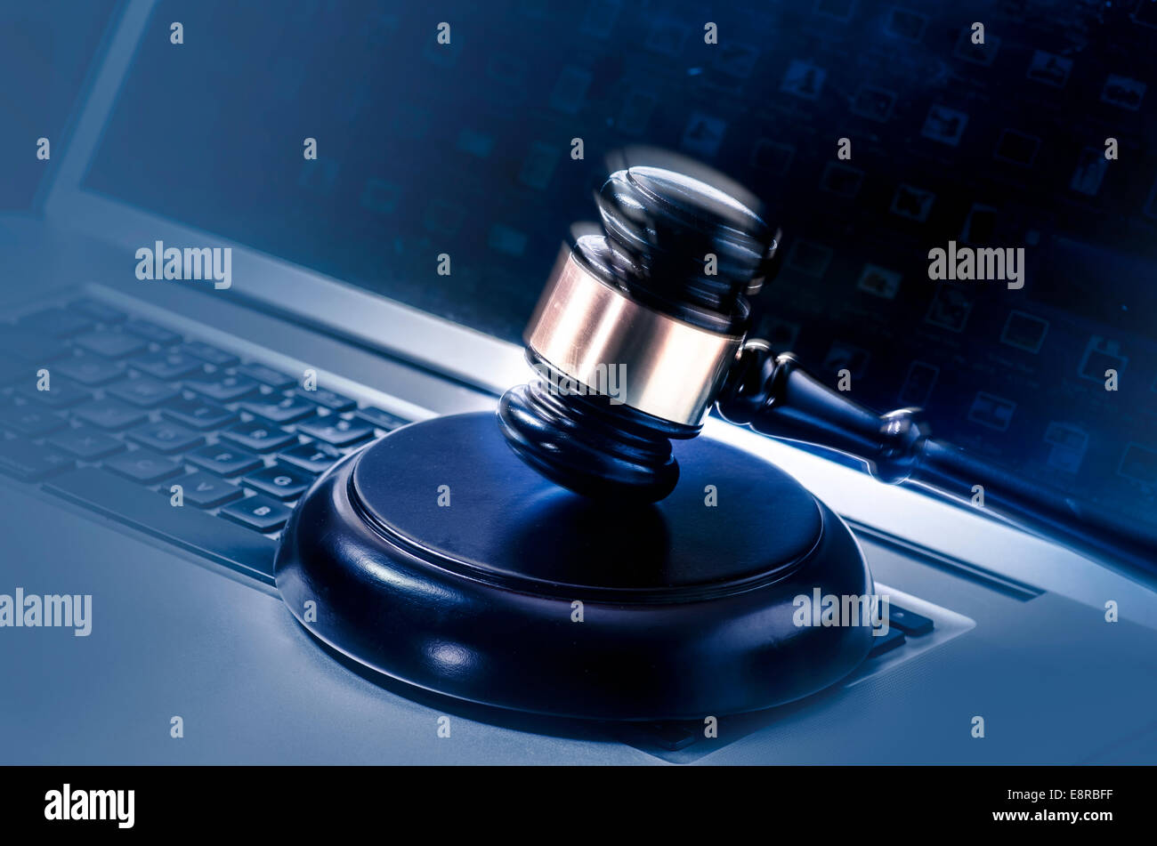 Gavel on Computer - cyber law crime concept image Stock Photo - Alamy