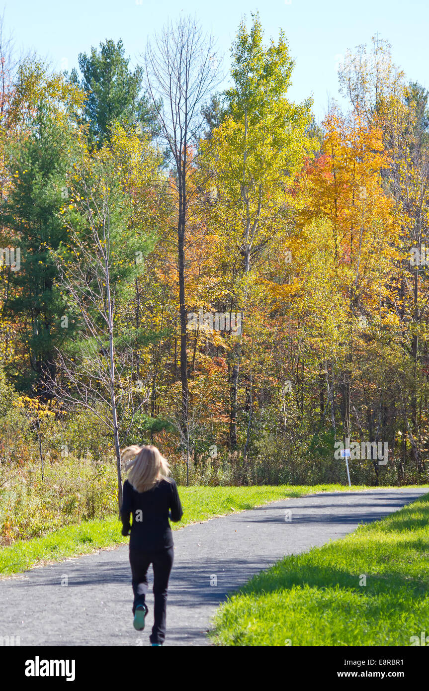 Jogging outdoors leaves hi-res stock photography and images - Alamy