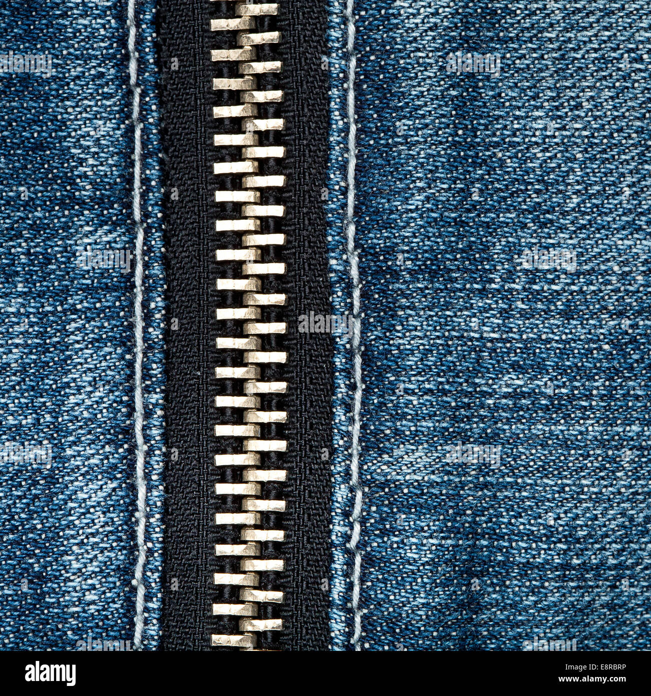 Blue jeans fabric with zipper background Stock Photo - Alamy