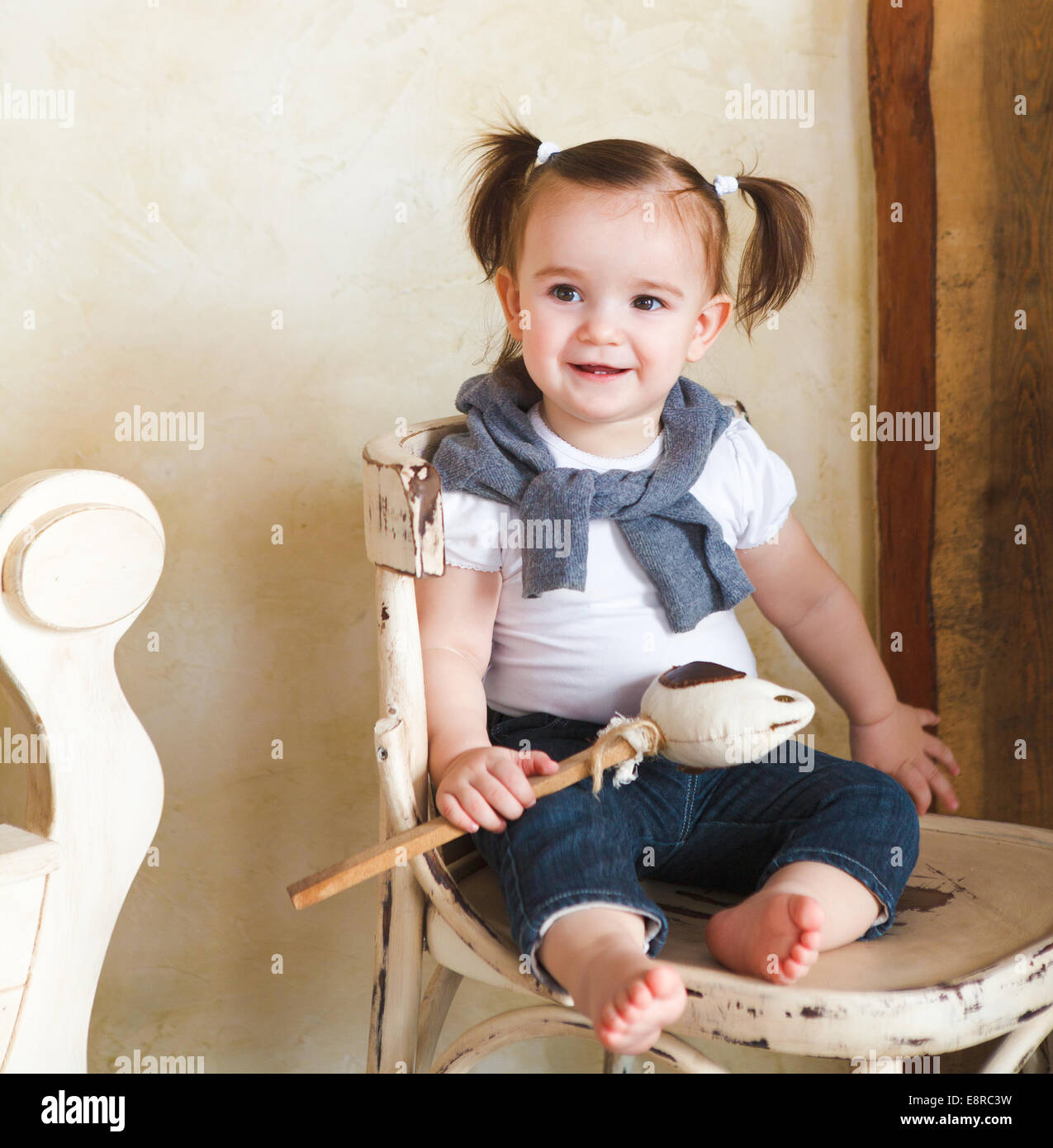 Portrait of the smiling one year old baby girl indoor Stock Photo - Alamy