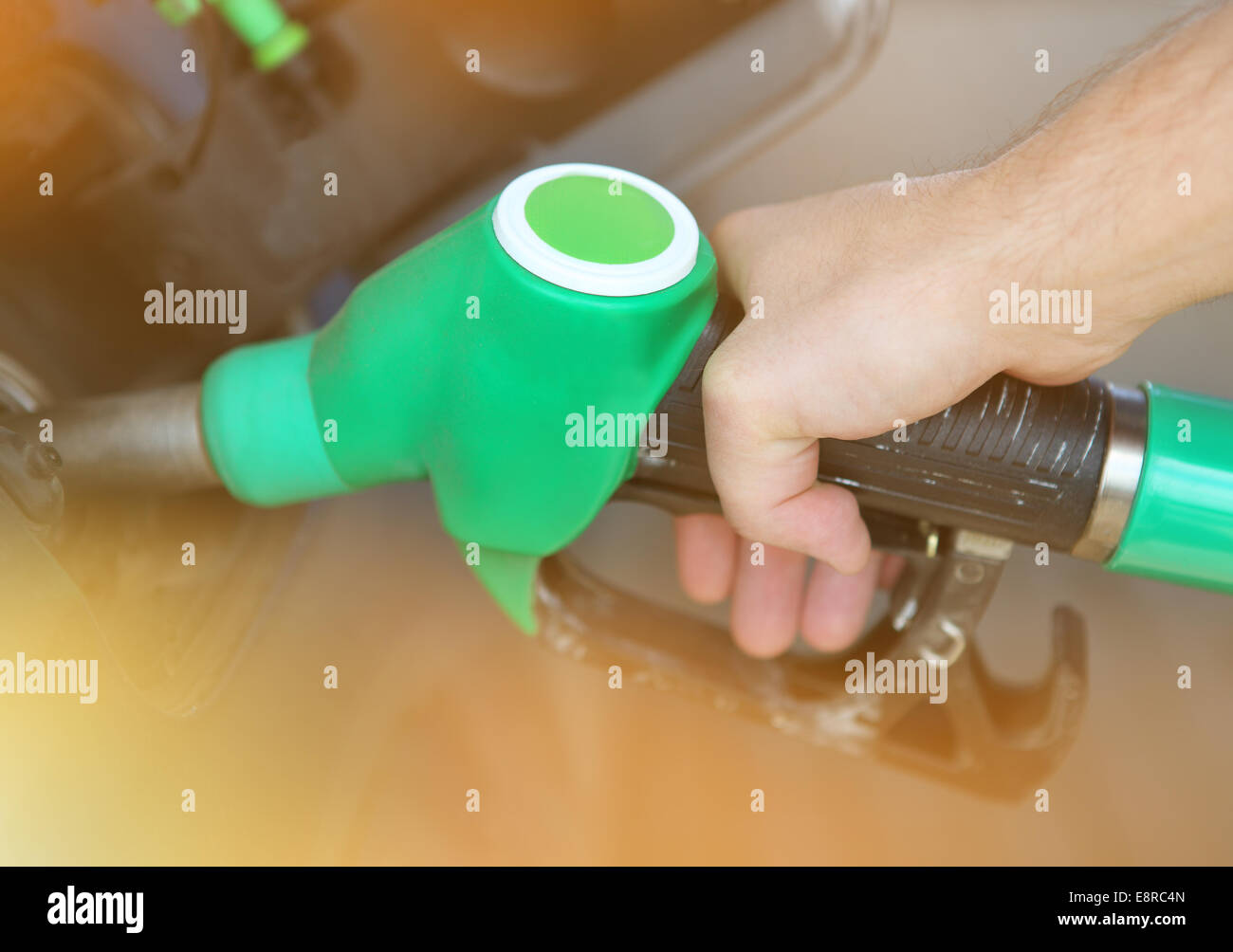 Green color fuel pump gun hi-res stock photography and images - Alamy