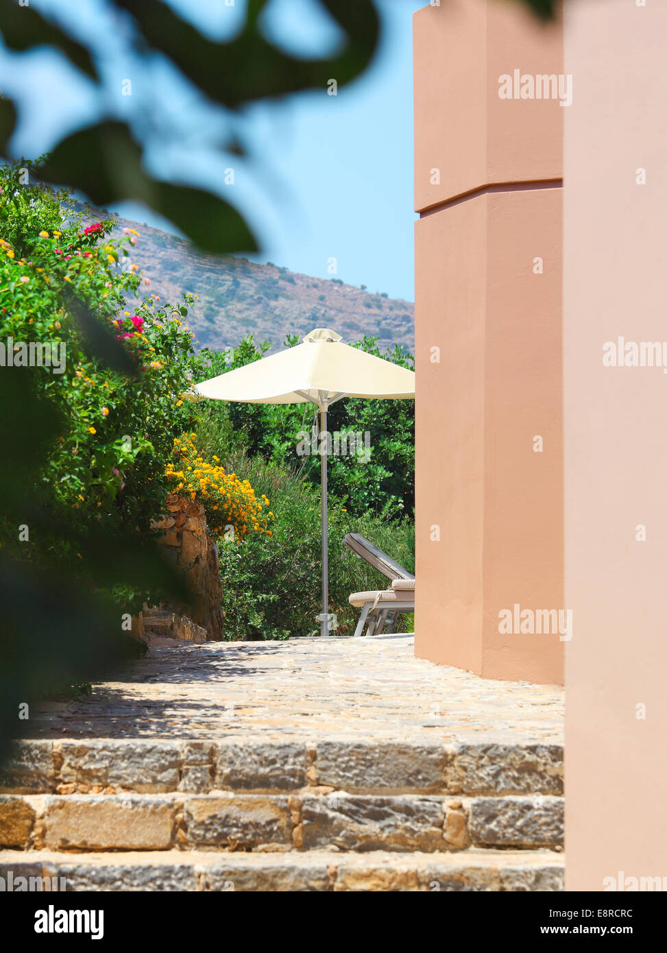 Garden Courtyard with beautiful flowers. Crete, Greece Stock Photo - Alamy