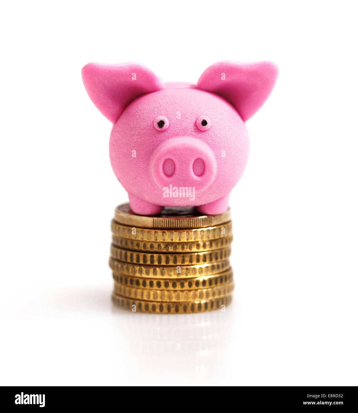Little pink pig on coins. Isolated on white Stock Photo - Alamy