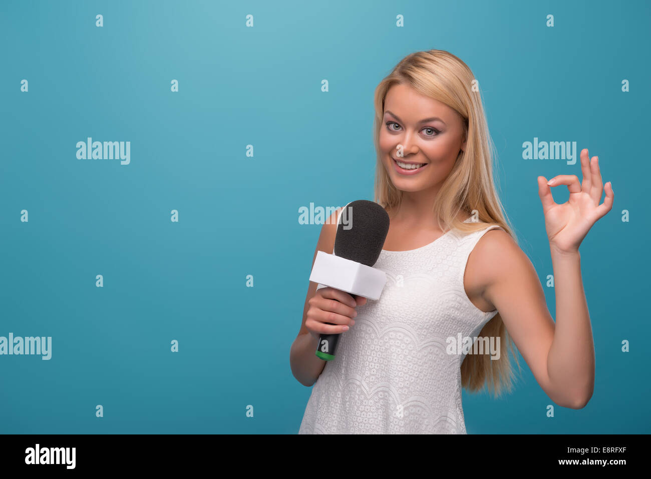 Very beautiful TV presenter Stock Photo - Alamy