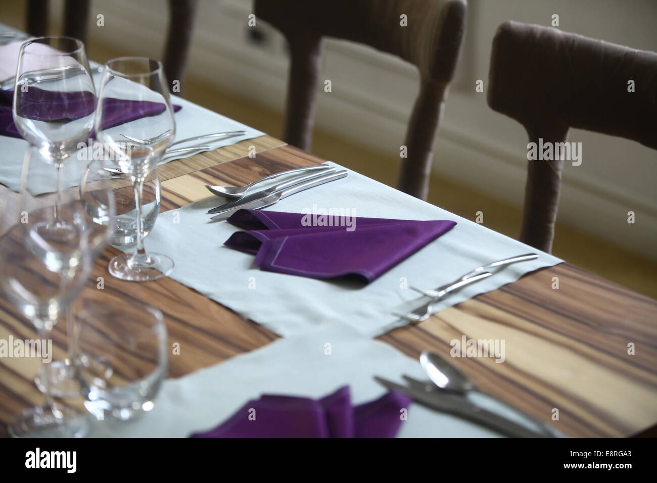 Shot with a dinner table in a restaurant Stock Photo - Alamy