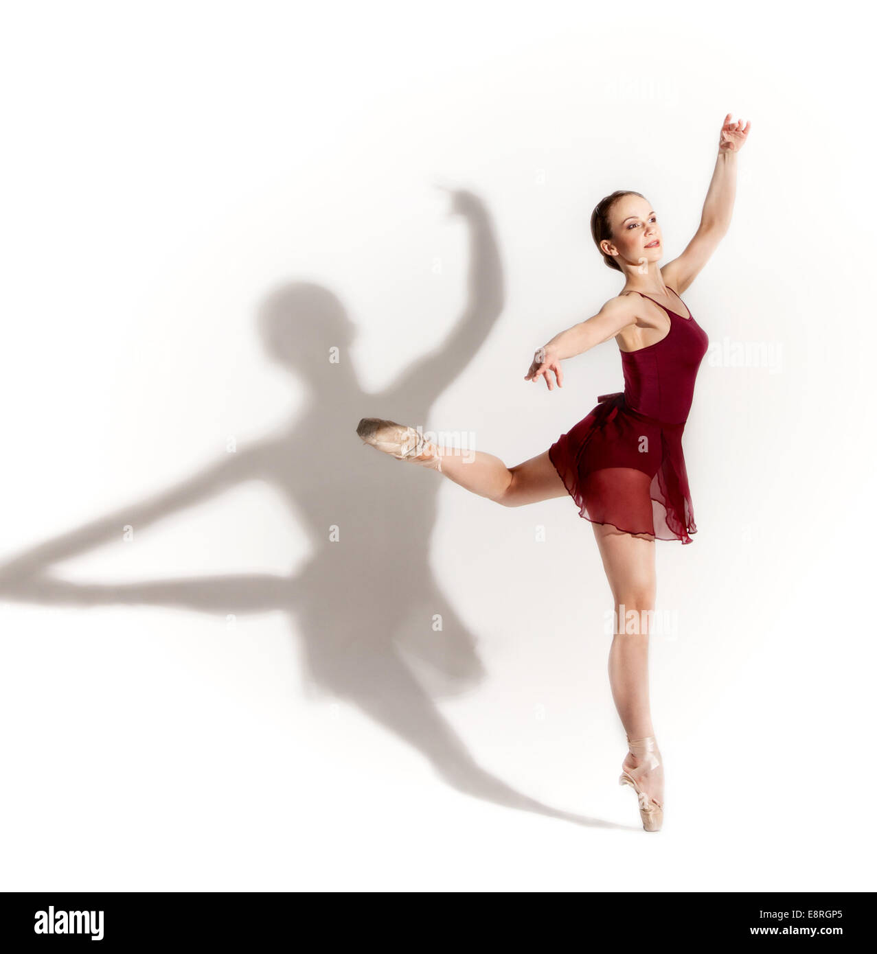 Modern style ballet dancer posing on studio background Stock Photo - Alamy
