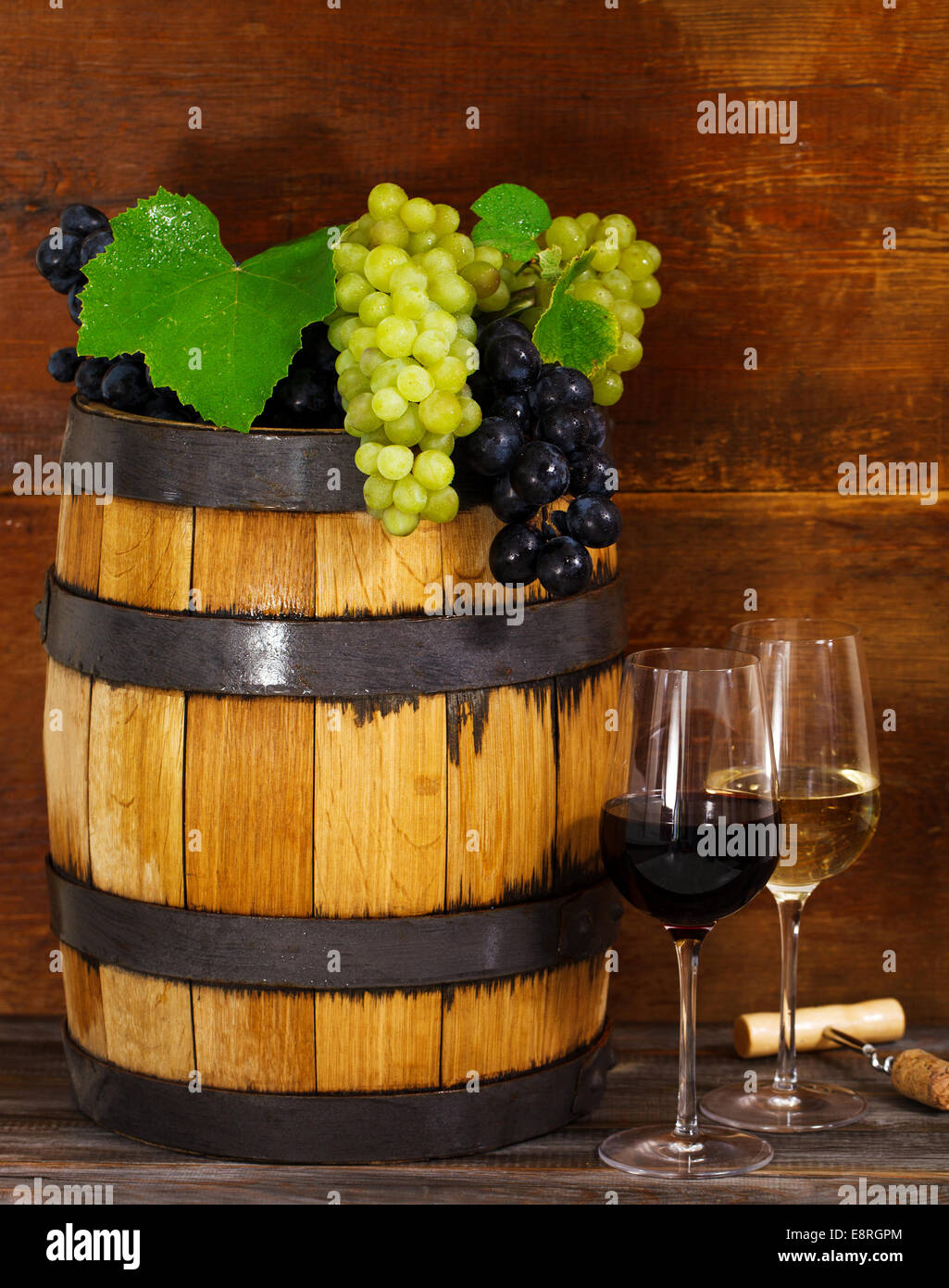 Still life with glasses of the red and white wine and barrel Stock ...