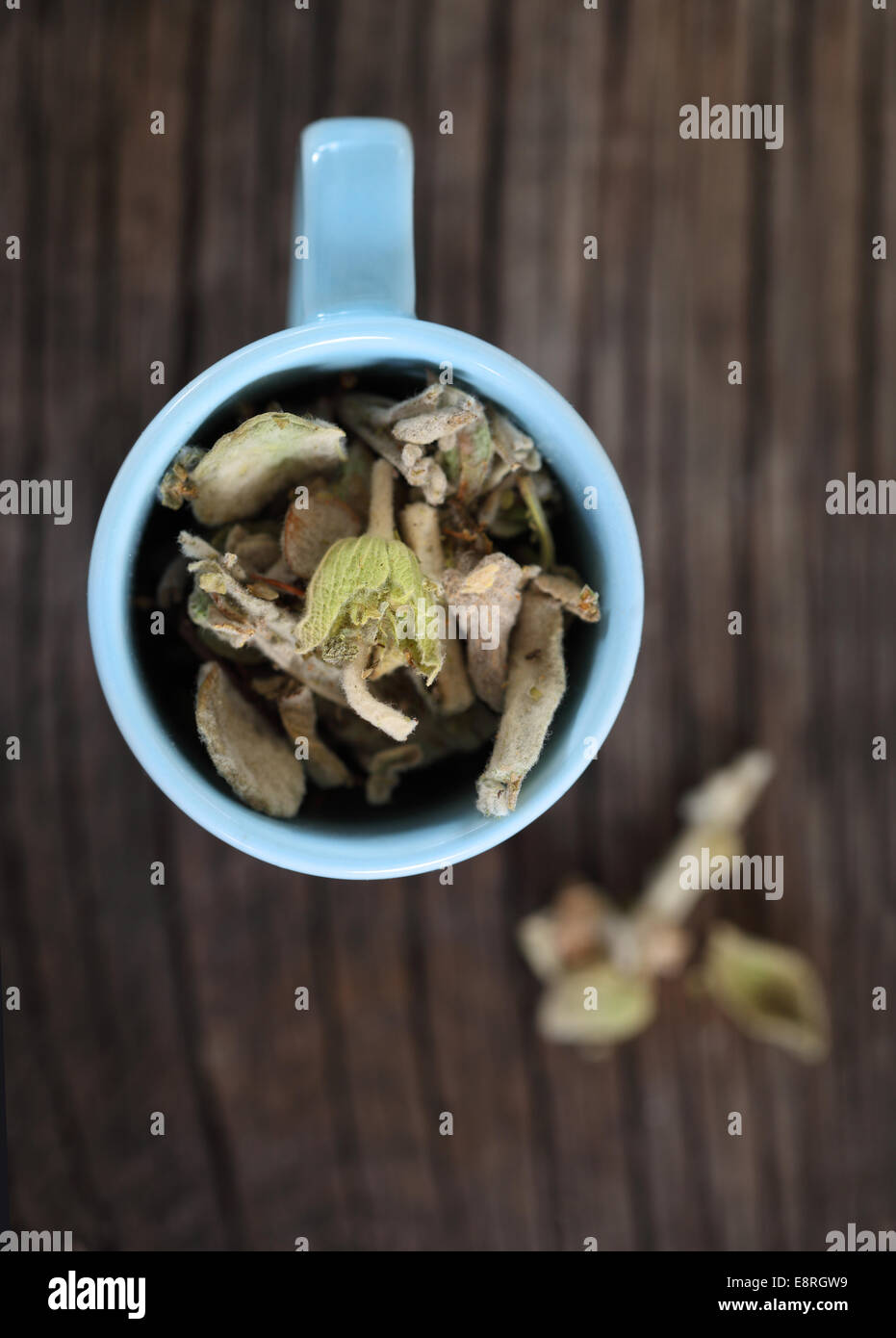 Close up of flower tea leaves in blue cup. Herbal tea Stock Photo - Alamy