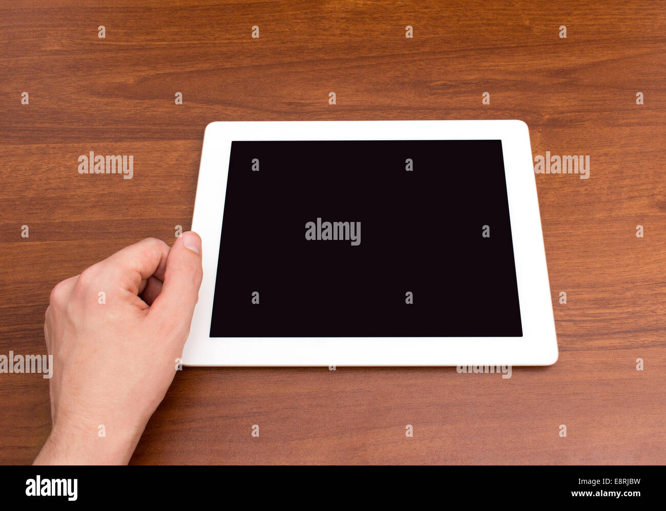 Digital tablet on wooden tablets gesture control Stock Photo - Alamy