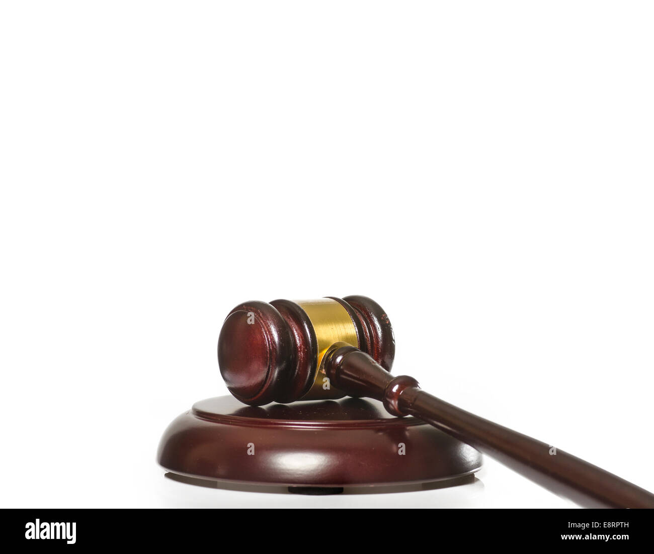 Law and order - Gavel on wood block isolated against white background ...