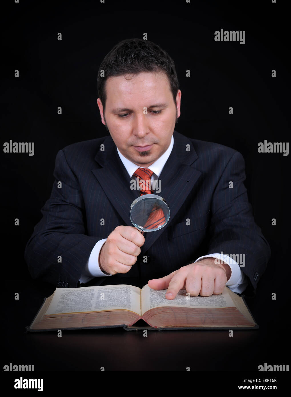 Old man using magnifying glass hi-res stock photography and images - Alamy