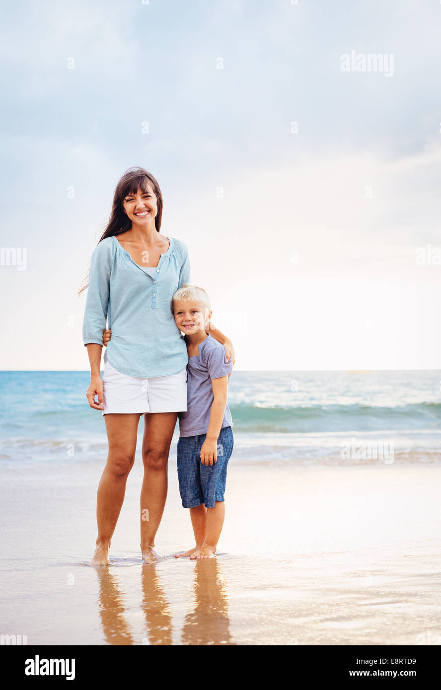 Mother and Son on the Beach by the Sea Stock Photo - Alamy