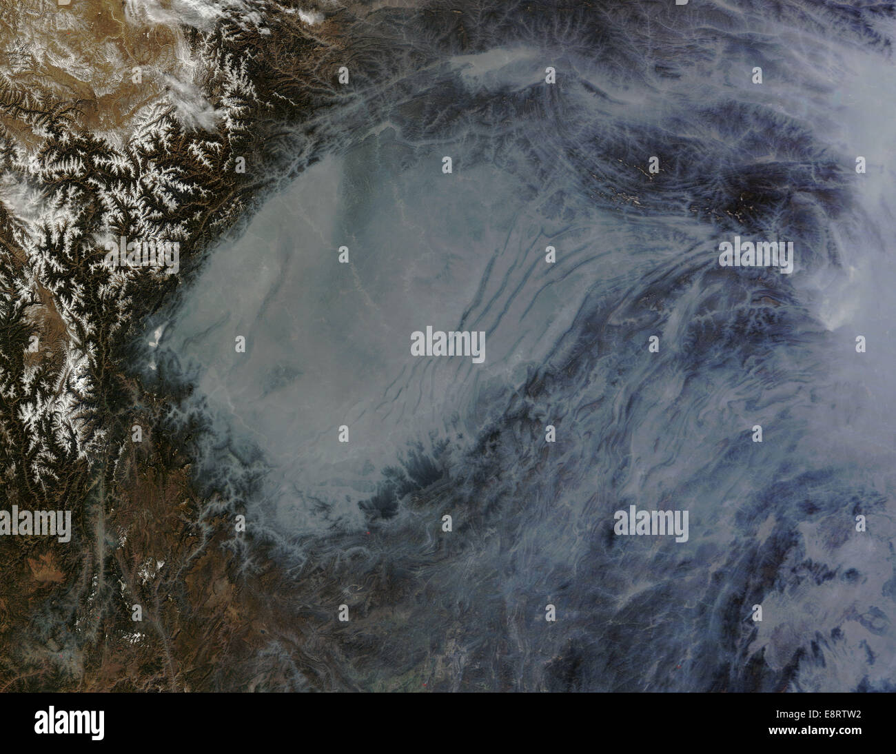 A satellite image shows haze over eastern China, highlighting pollution ...