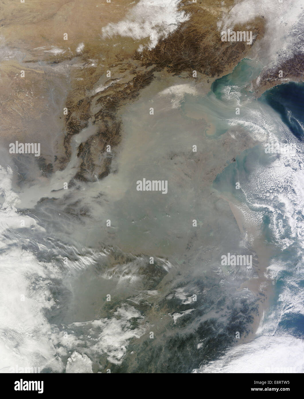 A layer of haze is visible over eastern China, affecting air quality ...