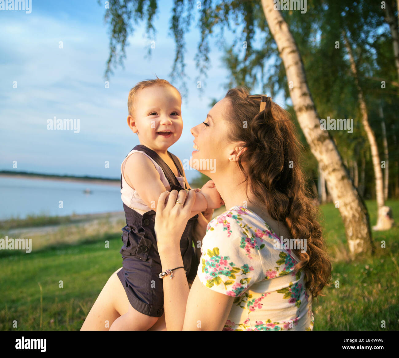 Portrait of the laughing mother and kid Stock Photo - Alamy