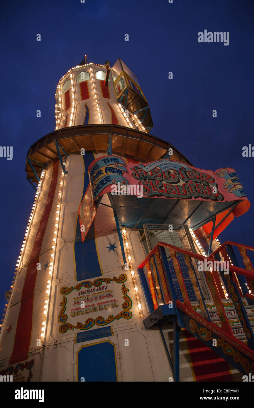 The Brighton Pier fairground at night Stock Photo - Alamy