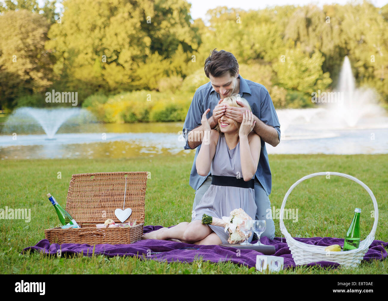 Photo presenting the romantic date in the park Stock Photo - Alamy