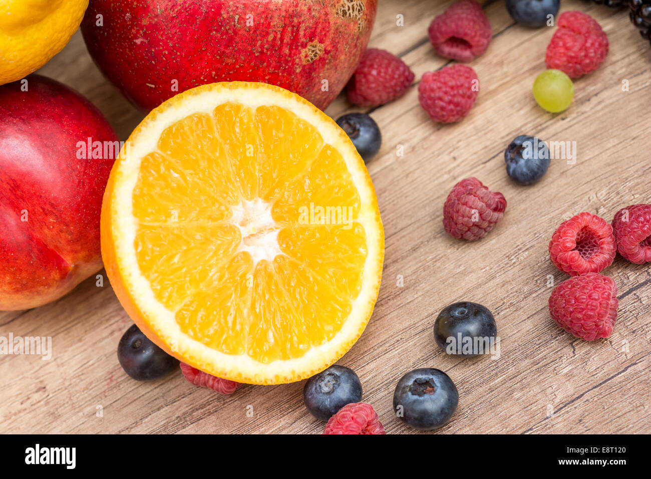 Healthy Tropical Fruits On Wood Table Stock Photo - Alamy