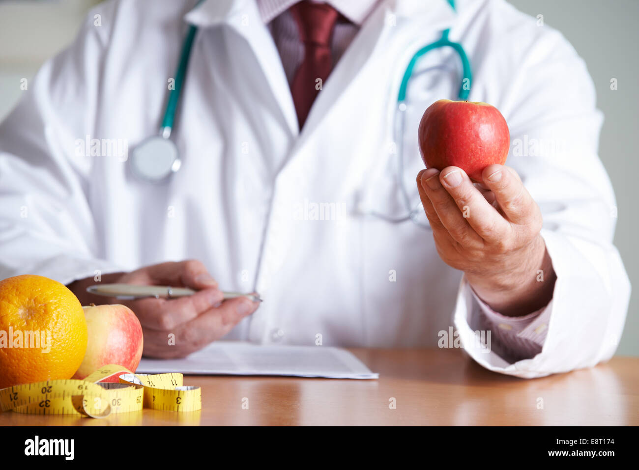 Doctor Giving Advice On Healthy Diet Stock Photo - Alamy